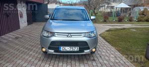 Pelēks Mitsubishi Outlander 2015 Rīga, ar dzinēja tilpumu 2.20 L un nobraukumu 301 tūkst. km par 8300 €, foto  vietnē AUTOMOTO.COM.LV