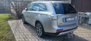 Pelēks Mitsubishi Outlander 2015 Rīga, ar dzinēja tilpumu 2.20 L un nobraukumu 301 tūkst. km par 8300 €, foto 6 vietnē AUTOMOTO.COM.LV
