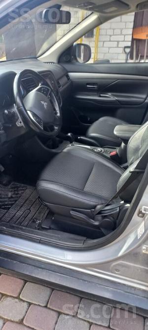 Pelēks Mitsubishi Outlander 2015 Rīga, ar dzinēja tilpumu 2.20 L un nobraukumu 301 tūkst. km par 8300 €, foto 11 vietnē AUTOMOTO.COM.LV