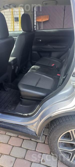 Pelēks Mitsubishi Outlander 2015 Rīga, ar dzinēja tilpumu 2.20 L un nobraukumu 301 tūkst. km par 8300 €, foto 12 vietnē AUTOMOTO.COM.LV