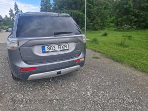 Pelēks Mitsubishi Outlander 2015 Tallina, ar dzinēja tilpumu 2.30 L un nobraukumu 313 tūkst. km par 7250 €, foto 5 vietnē AUTOMOTO.COM.LV