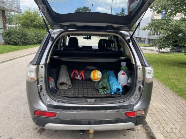 Grey Mitsubishi Outlander 2015 in Riga, with an engine capacity of 2.30 L and mileage of 241 thousand km for 8350 €, photo 6 on AUTOMOTO.COM.LV