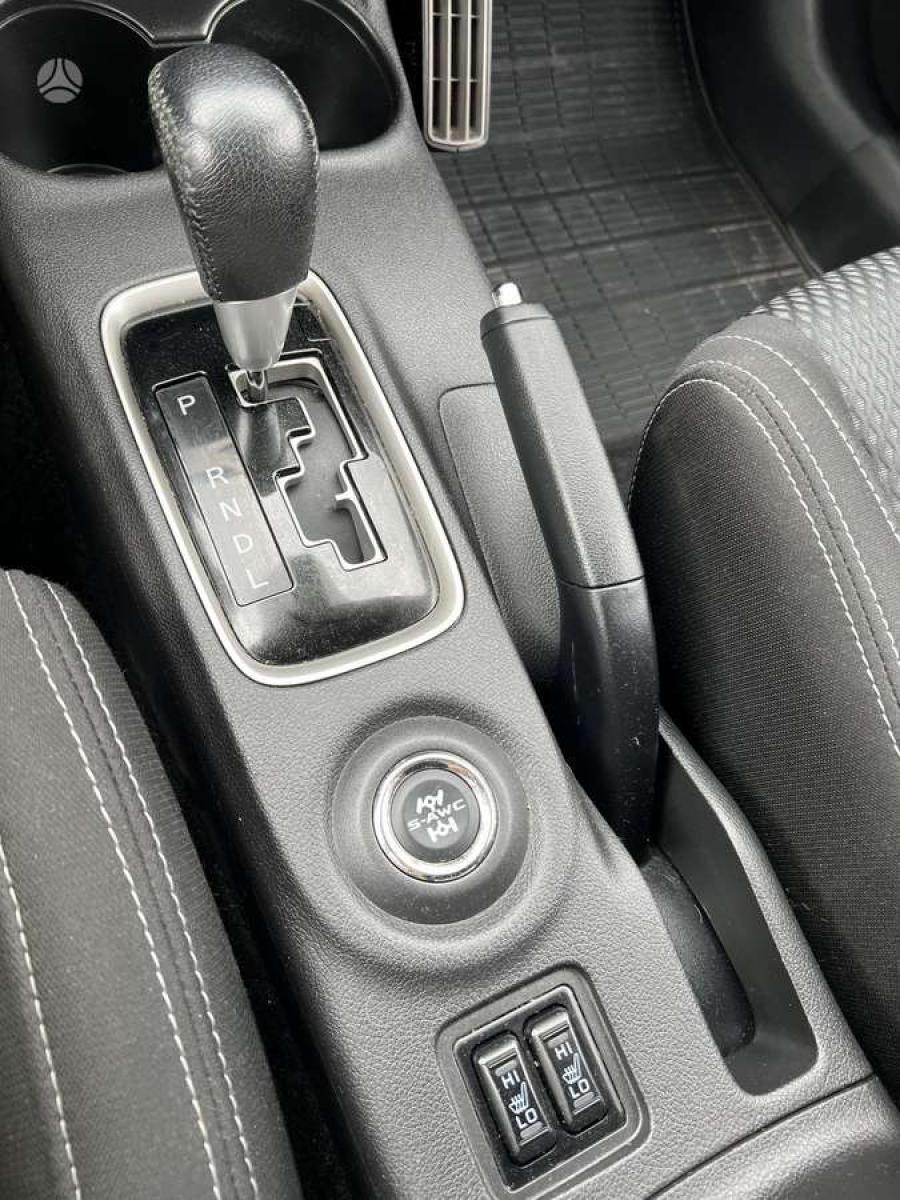 Grey Mitsubishi Outlander 2015 in Radviliskis, with an engine capacity of 2.27 L and mileage of 266 thousand km for 8950 €, photo 20 on AUTOMOTO.COM.LV