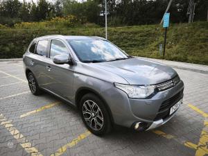 Grey Mitsubishi Outlander 2015 in Vilnius, with an engine capacity of 2.00 L and mileage of 241 thousand km for 8300 €, photo 9 on AUTOMOTO.COM.LV