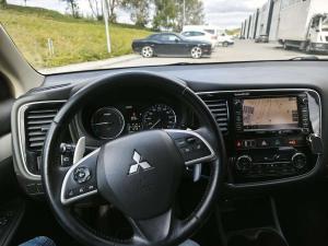 Grey Mitsubishi Outlander 2015 in Vilnius, with an engine capacity of 2.00 L and mileage of 241 thousand km for 8300 €, photo 23 on AUTOMOTO.COM.LV