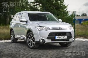 Pelēks Mitsubishi Outlander 2015 Rīga, ar dzinēja tilpumu 2.30 L un nobraukumu 314 tūkst. km par 7490 €, foto 4 vietnē AUTOMOTO.COM.LV