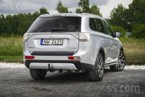 Pelēks Mitsubishi Outlander 2015 Rīga, ar dzinēja tilpumu 2.30 L un nobraukumu 314 tūkst. km par 7490 €, foto 7 vietnē AUTOMOTO.COM.LV