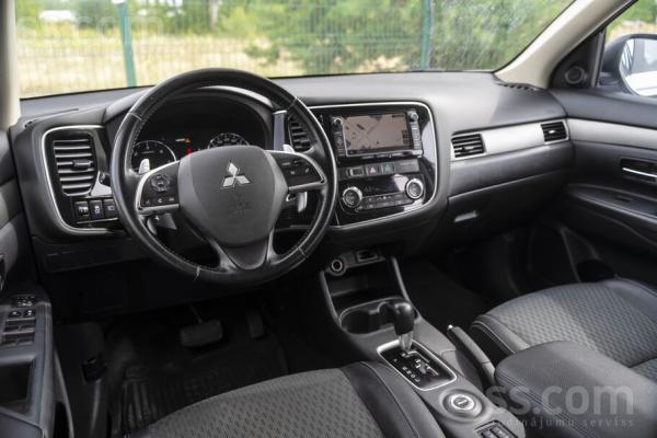 Pelēks Mitsubishi Outlander 2015 Rīga, ar dzinēja tilpumu 2.30 L un nobraukumu 314 tūkst. km par 7490 €, foto 8 vietnē AUTOMOTO.COM.LV