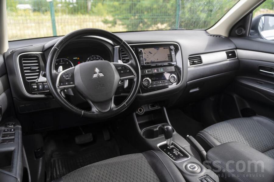 Pelēks Mitsubishi Outlander 2015 Rīga, ar dzinēja tilpumu 2.30 L un nobraukumu 314 tūkst. km par 7490 €, foto 8 vietnē AUTOMOTO.COM.LV