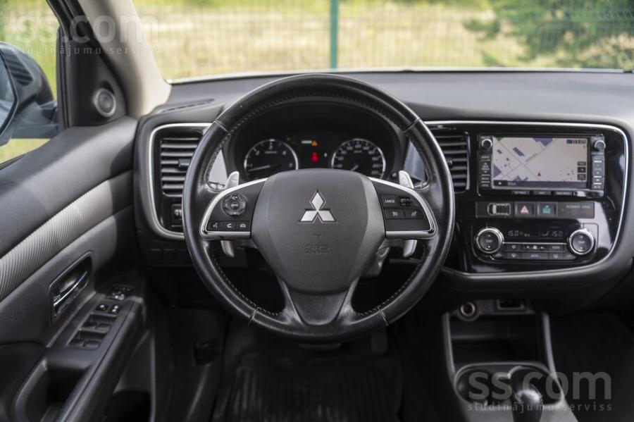 Pelēks Mitsubishi Outlander 2015 Rīga, ar dzinēja tilpumu 2.30 L un nobraukumu 314 tūkst. km par 7490 €, foto 16 vietnē AUTOMOTO.COM.LV