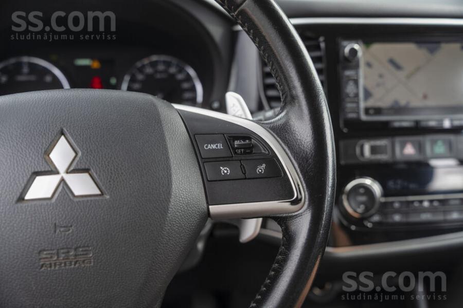 Pelēks Mitsubishi Outlander 2015 Rīga, ar dzinēja tilpumu 2.30 L un nobraukumu 314 tūkst. km par 7490 €, foto 17 vietnē AUTOMOTO.COM.LV
