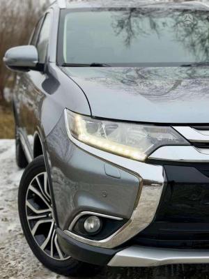 Grey Mitsubishi Outlander 2016 in Siauliai, with an engine capacity of 2.27 L and mileage of 238 thousand km for 12550 €, photo 15 on AUTOMOTO.COM.LV