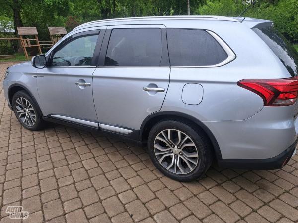 Pelēks Mitsubishi Outlander 2016 Viļņa, ar dzinēja tilpumu 2.00 L un nobraukumu 263 tūkst. km par 9800 €, foto 2 vietnē AUTOMOTO.COM.LV