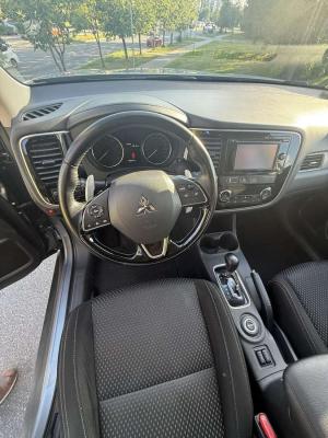 Grey Mitsubishi Outlander 2016 in Vilnius, with an engine capacity of 2.00 L and mileage of 104 thousand km for 16490 €, photo 6 on AUTOMOTO.COM.LV