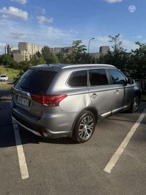 Grey Mitsubishi Outlander 2016 in Vilnius, with an engine capacity of 2.00 L and mileage of 104 thousand km for 16490 €, photo 13 on AUTOMOTO.COM.LV