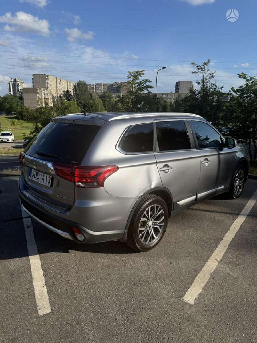 Grey Mitsubishi Outlander 2016 in Vilnius, with an engine capacity of 2.00 L and mileage of 104 thousand km for 16490 €, photo 13 on AUTOMOTO.COM.LV