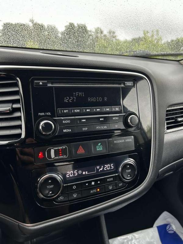 Grey Mitsubishi Outlander 2016 in Panevezys, with an engine capacity of 2.00 L and mileage of 257 thousand km for 8200 €, photo 10 on AUTOMOTO.COM.LV