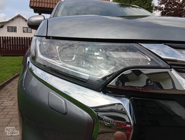 Grey Mitsubishi Outlander 2016 in Siauliai, with an engine capacity of 2.20 L and mileage of 174 thousand km for 11600 €, photo 9 on AUTOMOTO.COM.LV