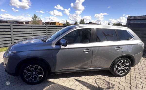 Grey Mitsubishi Outlander 2016 in Klaipeda, with an engine capacity of 2.20 L and mileage of 255 thousand km for 6750 €, photo 4 on AUTOMOTO.COM.LV