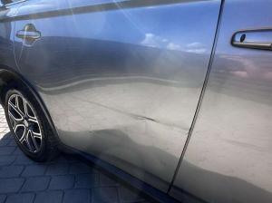 Grey Mitsubishi Outlander 2016 in Klaipeda, with an engine capacity of 2.20 L and mileage of 255 thousand km for 6750 €, photo 26 on AUTOMOTO.COM.LV