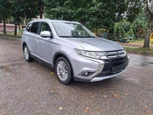 Grey Mitsubishi Outlander 2016 in Raseiniai, with an engine capacity of 2.27 L and mileage of 244 thousand km for 9200 €, photo  on AUTOMOTO.COM.LV
