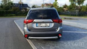 Pelēks Mitsubishi Outlander 2016 Valmiera, ar dzinēja tilpumu 2.00 L un nobraukumu 240 tūkst. km par 11500 €, foto 4 vietnē AUTOMOTO.COM.LV