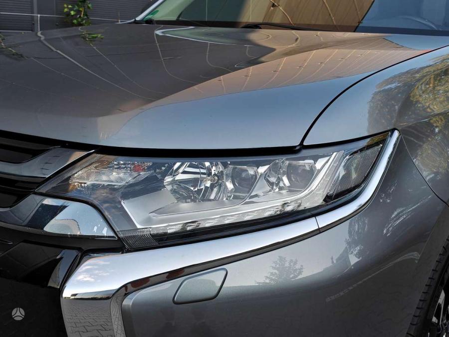 Grey Mitsubishi Outlander 2018 in Klaipeda, with an engine capacity of 2.00 L and mileage of 143 thousand km for 15950 €, photo 16 on AUTOMOTO.COM.LV
