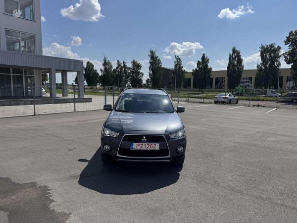 Pelēks Mitsubishi Outlander 2012 Marijampole, ar dzinēja tilpumu 2.18 L un nobraukumu 319 tūkst. km par 4599 €, foto 1 vietnē AUTOMOTO.COM.LV
