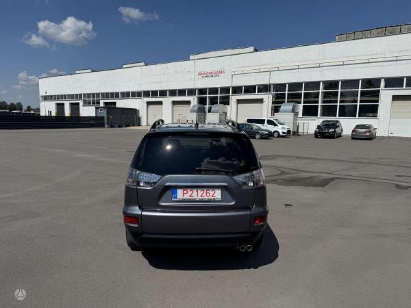 Pelēks Mitsubishi Outlander 2012 Marijampole, ar dzinēja tilpumu 2.18 L un nobraukumu 319 tūkst. km par 4599 €, foto 4 vietnē AUTOMOTO.COM.LV