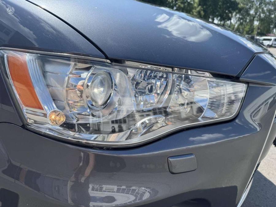 Grey Mitsubishi Outlander 2012 in Marijampole, with an engine capacity of 2.18 L and mileage of 319 thousand km for 4599 €, photo 8 on AUTOMOTO.COM.LV