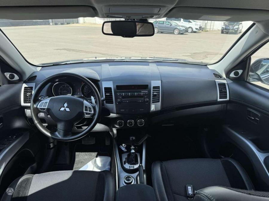 Grey Mitsubishi Outlander 2012 in Marijampole, with an engine capacity of 2.18 L and mileage of 319 thousand km for 4599 €, photo 16 on AUTOMOTO.COM.LV