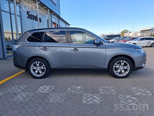 Grey Mitsubishi Outlander 2014 in Liepaja, with an engine capacity of 2.00 L and mileage of 173 thousand km for 9400 €, photo 4 on AUTOMOTO.COM.LV