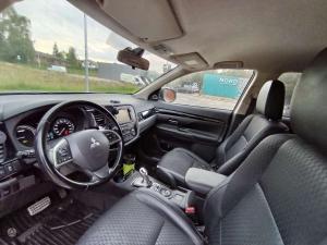 Grey Mitsubishi Outlander 2014 in Vilnius, with an engine capacity of 2.00 L and mileage of 205 thousand km for 8100 €, photo 9 on AUTOMOTO.COM.LV