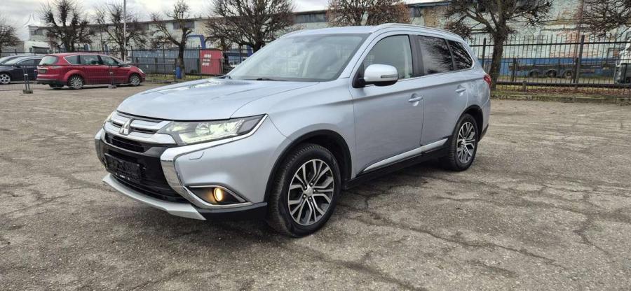 Grey Mitsubishi Outlander 2015 in Marijampole, with an engine capacity of 2.20 L and mileage of 266 thousand km for 8450 €, photo 1 on AUTOMOTO.COM.LV