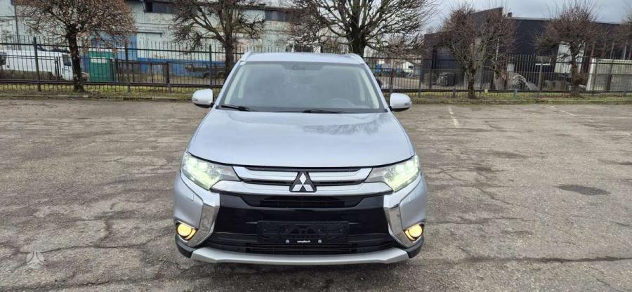 Grey Mitsubishi Outlander 2015 in Marijampole, with an engine capacity of 2.20 L and mileage of 266 thousand km for 8450 €, photo 2 on AUTOMOTO.COM.LV