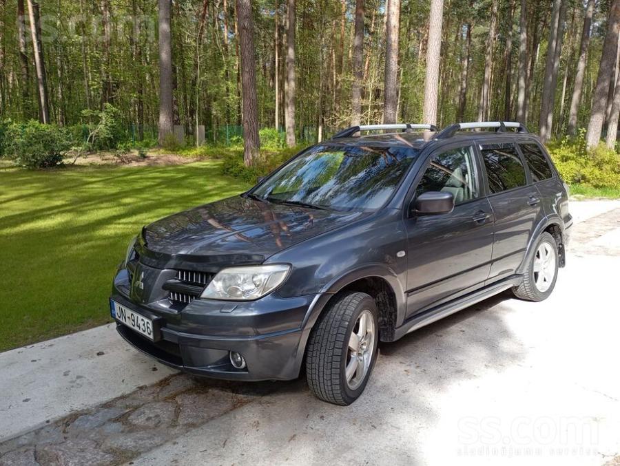 Pelēks Mitsubishi Outlander 2007 Jūrmala, ar dzinēja tilpumu 2.40 L un nobraukumu 277 tūkst. km par 1750 €, foto 1 vietnē AUTOMOTO.COM.LV