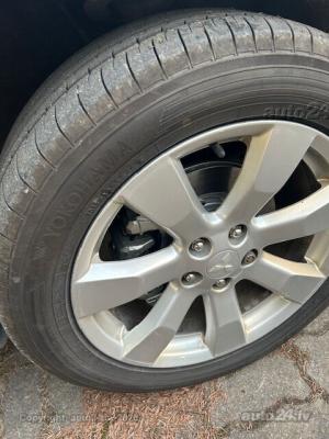 Pelēks Mitsubishi Outlander 2012 Tallina, ar dzinēja tilpumu 2.40 L un nobraukumu 233 tūkst. km par 5690 €, foto 9 vietnē AUTOMOTO.COM.LV