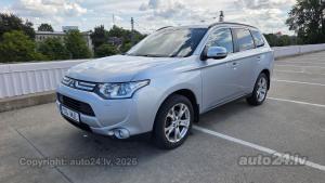 Pelēks Mitsubishi Outlander 2014 Tallina, ar dzinēja tilpumu 2.00 L un nobraukumu 280 tūkst. km par 5990 €, foto  vietnē AUTOMOTO.COM.LV
