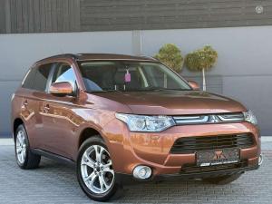 Orange Mitsubishi Outlander 2012 in Siauliai, with an engine capacity of 2.27 L and mileage of 243 thousand km for 8450 €, photo  on AUTOMOTO.COM.LV