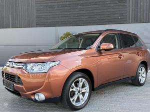 Orange Mitsubishi Outlander 2012 in Siauliai, with an engine capacity of 2.27 L and mileage of 243 thousand km for 8450 €, photo 5 on AUTOMOTO.COM.LV