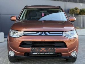 Orange Mitsubishi Outlander 2012 in Siauliai, with an engine capacity of 2.27 L and mileage of 243 thousand km for 8450 €, photo 12 on AUTOMOTO.COM.LV