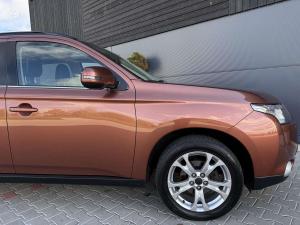 Orange Mitsubishi Outlander 2012 in Siauliai, with an engine capacity of 2.27 L and mileage of 243 thousand km for 8450 €, photo 15 on AUTOMOTO.COM.LV