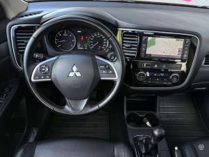 Orange Mitsubishi Outlander 2012 in Siauliai, with an engine capacity of 2.27 L and mileage of 243 thousand km for 8450 €, photo 23 on AUTOMOTO.COM.LV