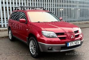 Sarkans Mitsubishi Outlander 2003 Tallina, ar dzinēja tilpumu 2.40 L un nobraukumu 275 tūkst. km par 1499 €, foto  vietnē AUTOMOTO.COM.LV