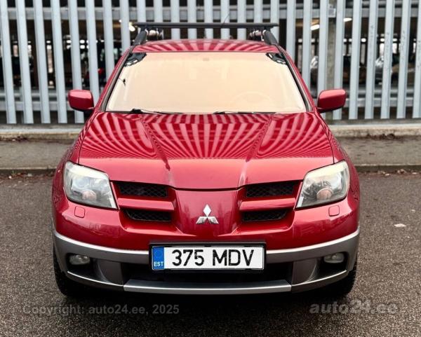 Sarkans Mitsubishi Outlander 2003 Tallina, ar dzinēja tilpumu 2.40 L un nobraukumu 275 tūkst. km par 1499 €, foto 2 vietnē AUTOMOTO.COM.LV
