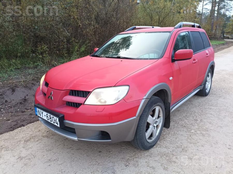 Sarkans Mitsubishi Outlander 2006 Rīga, ar dzinēja tilpumu 2.40 L un nobraukumu 217 tūkst. km par 800 €, foto 1 vietnē AUTOMOTO.COM.LV