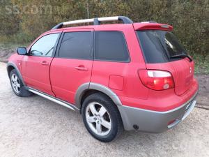 Sarkans Mitsubishi Outlander 2006 Rīga, ar dzinēja tilpumu 2.40 L un nobraukumu 217 tūkst. km par 800 €, foto 3 vietnē AUTOMOTO.COM.LV