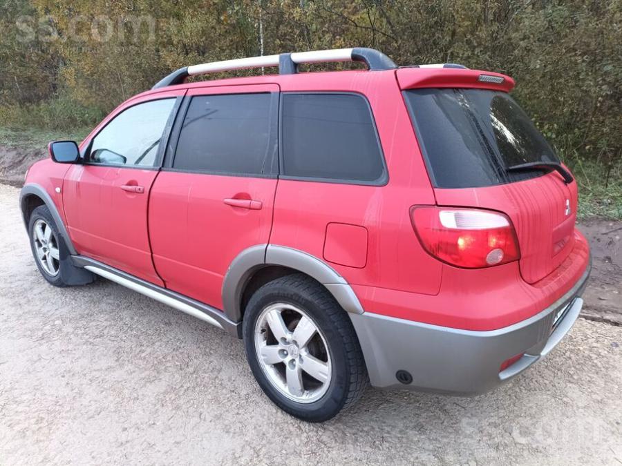 Sarkans Mitsubishi Outlander 2006 Rīga, ar dzinēja tilpumu 2.40 L un nobraukumu 217 tūkst. km par 800 €, foto 3 vietnē AUTOMOTO.COM.LV