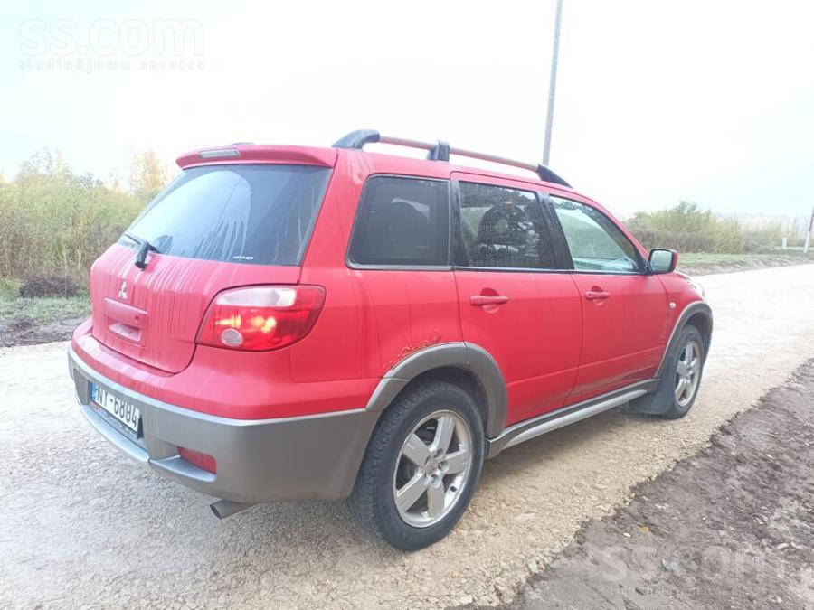 Sarkans Mitsubishi Outlander 2006 Rīga, ar dzinēja tilpumu 2.40 L un nobraukumu 217 tūkst. km par 800 €, foto 4 vietnē AUTOMOTO.COM.LV
