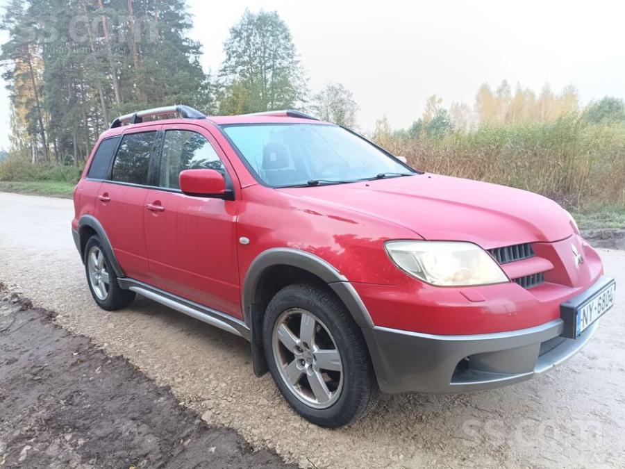 Sarkans Mitsubishi Outlander 2006 Rīga, ar dzinēja tilpumu 2.40 L un nobraukumu 217 tūkst. km par 800 €, foto 5 vietnē AUTOMOTO.COM.LV